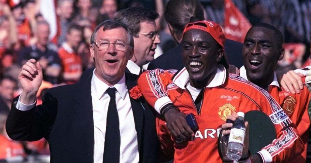 Manchester United's Dwight Yorke with manager Alex Ferguson after the ...